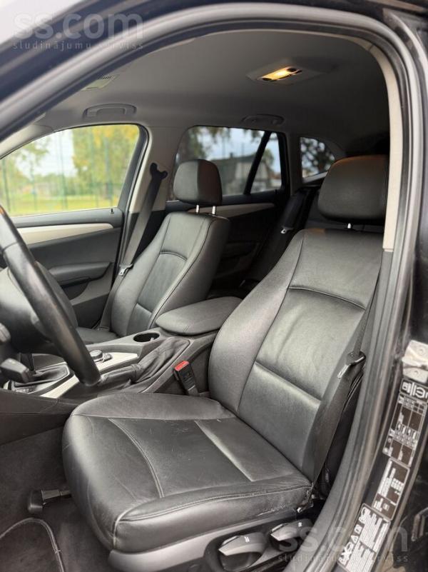 Black BMW X1 2011 in Bauska, with an engine capacity of 2.00 L and mileage of 290 thousand km for 7390 €, photo 6 on AUTOMOTO.COM.LV