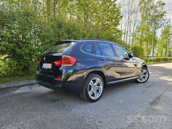 Black BMW X1 2012 in Riga, with an engine capacity of 2.00 L and mileage of 0 thousand km for 10450 €, photo 6 on AUTOMOTO.COM.LV