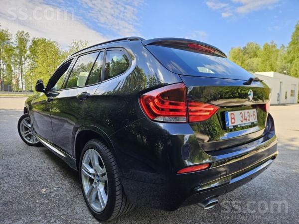 Black BMW X1 2012 in Riga, with an engine capacity of 2.00 L and mileage of 0 thousand km for 10450 €, photo 10 on AUTOMOTO.COM.LV