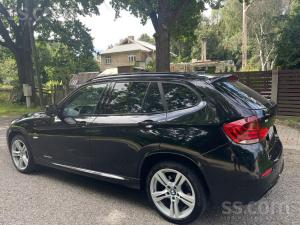 Black BMW X1 2012 in Riga, with an engine capacity of 2.00 L and mileage of 217 thousand km for 7650 €, photo 7 on AUTOMOTO.COM.LV