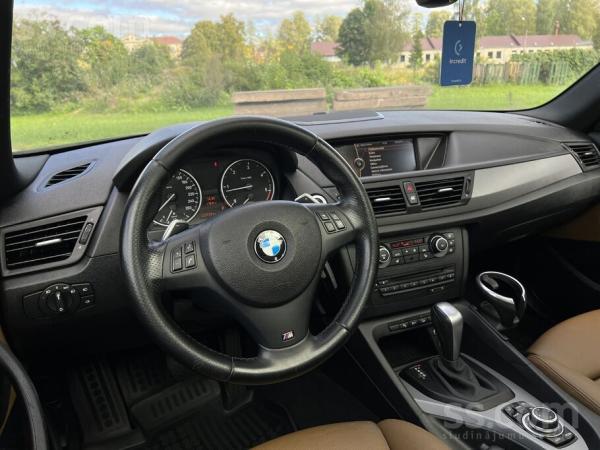 Black BMW X1 2012 in Cesis, with an engine capacity of 2.00 L and mileage of 224 thousand km for 10800 €, photo 7 on AUTOMOTO.COM.LV