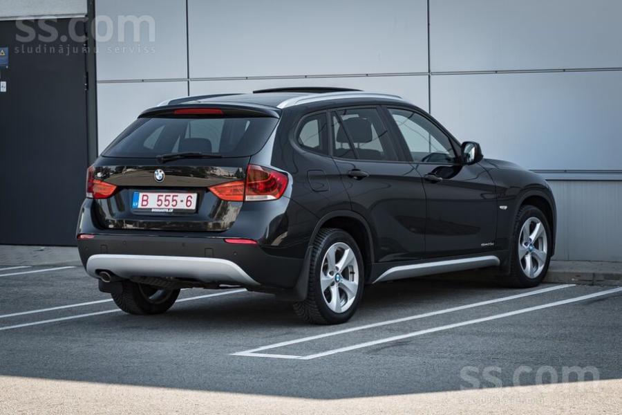 Black BMW X1 2012 in Riga, with an engine capacity of 2.00 L and mileage of 0 thousand km for 8250 €, photo 4 on AUTOMOTO.COM.LV