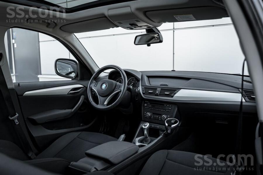 Black BMW X1 2012 in Riga, with an engine capacity of 2.00 L and mileage of 0 thousand km for 8250 €, photo 14 on AUTOMOTO.COM.LV