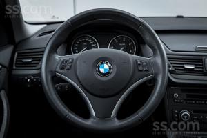 Black BMW X1 2012 in Riga, with an engine capacity of 2.00 L and mileage of 0 thousand km for 8250 €, photo 17 on AUTOMOTO.COM.LV
