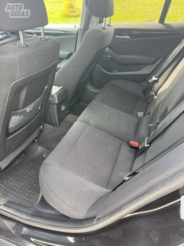 Black BMW X1 2012 in Kaunas, with an engine capacity of 2.00 L and mileage of 374 thousand km for 6500 €, photo 9 on AUTOMOTO.COM.LV