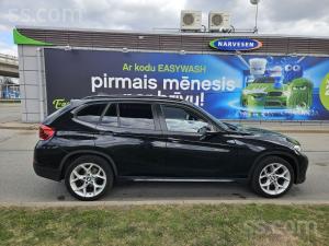 Melns BMW X1 2012 Rīga, ar dzinēja tilpumu 2.00 L un nobraukumu 278 tūkst. km par 12498 €, foto  vietnē AUTOMOTO.COM.LV