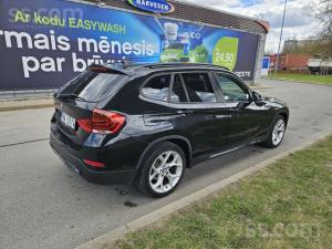 Black BMW X1 2012 in Riga, with an engine capacity of 2.00 L and mileage of 278 thousand km for 12498 €, photo 5 on AUTOMOTO.COM.LV