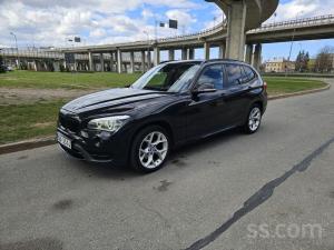 Black BMW X1 2012 in Riga, with an engine capacity of 2.00 L and mileage of 278 thousand km for 12498 €, photo 6 on AUTOMOTO.COM.LV