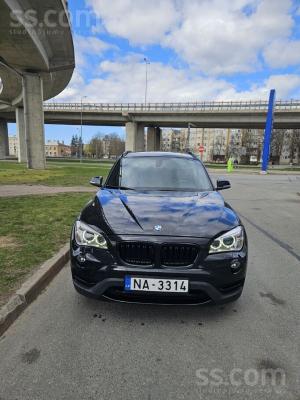 Black BMW X1 2012 in Riga, with an engine capacity of 2.00 L and mileage of 278 thousand km for 12498 €, photo 8 on AUTOMOTO.COM.LV