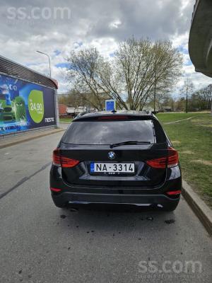 Black BMW X1 2012 in Riga, with an engine capacity of 2.00 L and mileage of 278 thousand km for 12498 €, photo 9 on AUTOMOTO.COM.LV