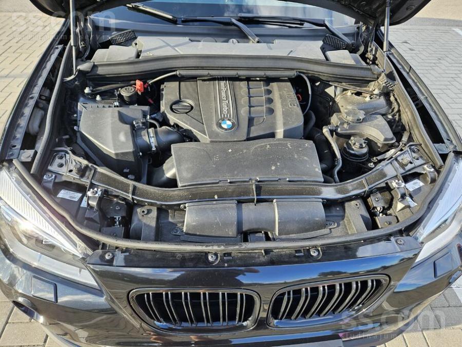 Black BMW X1 2012 in Riga, with an engine capacity of 2.00 L and mileage of 278 thousand km for 12498 €, photo 11 on AUTOMOTO.COM.LV