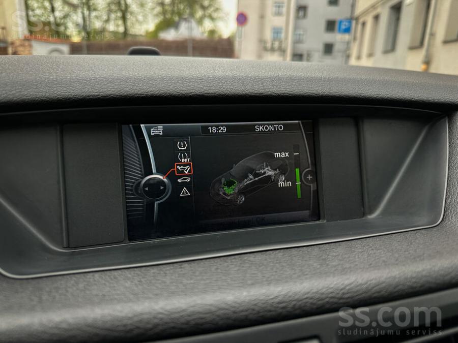Black BMW X1 2012 in Jelgava, with an engine capacity of 2.00 L and mileage of 226 thousand km for 6350 €, photo 12 on AUTOMOTO.COM.LV