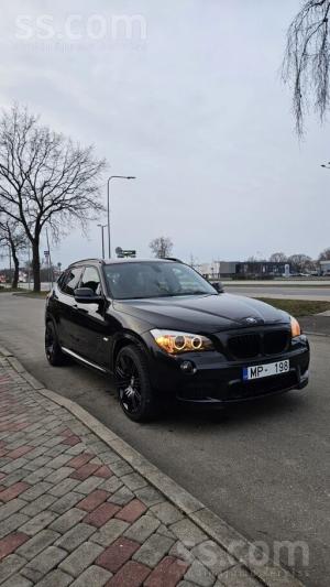 Black BMW X1 2012 in Riga, with an engine capacity of 2.00 L and mileage of 189 thousand km for 9600 €, photo  on AUTOMOTO.COM.LV