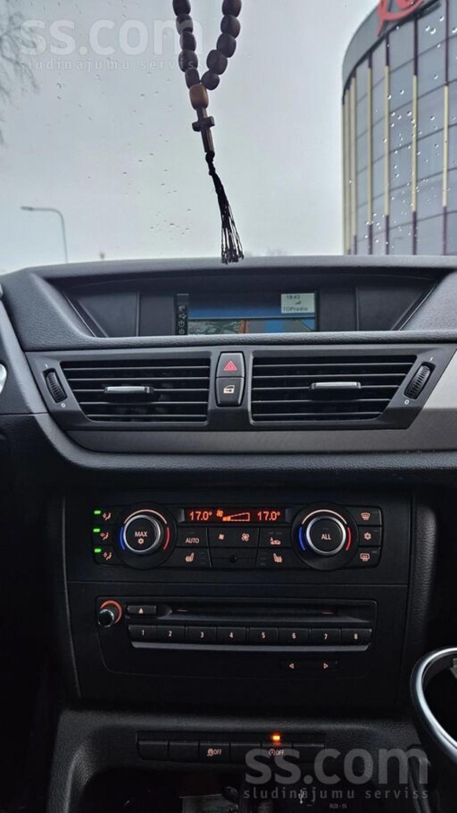 Black BMW X1 2012 in Riga, with an engine capacity of 2.00 L and mileage of 189 thousand km for 9600 €, photo 11 on AUTOMOTO.COM.LV