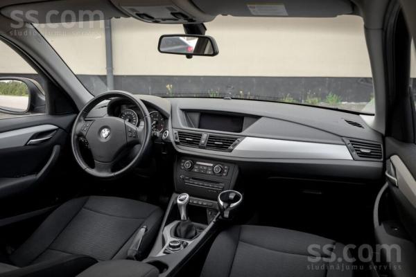 Black BMW X1 2012 in Tukums, with an engine capacity of 2.00 L and mileage of 262 thousand km for 9450 €, photo 8 on AUTOMOTO.COM.LV