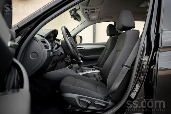 Black BMW X1 2012 in Tukums, with an engine capacity of 2.00 L and mileage of 262 thousand km for 9450 €, photo 9 on AUTOMOTO.COM.LV