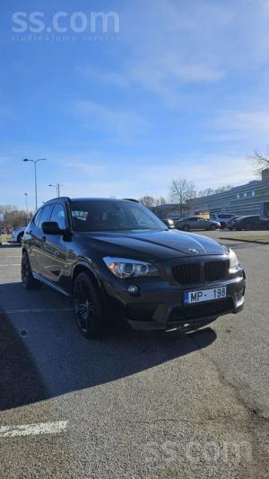 Black BMW X1 2012 in Riga, with an engine capacity of 2.00 L and mileage of 187 thousand km for 9100 €, photo  on AUTOMOTO.COM.LV