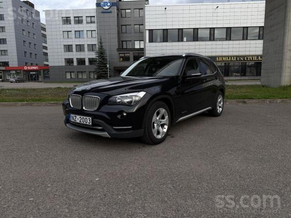 Black BMW X1 2012 in Riga, with an engine capacity of 2.00 L and mileage of 349 thousand km for 6700 €, photo 1 on AUTOMOTO.COM.LV