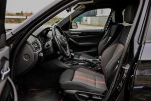 Black BMW X1 2012 in Riga, with an engine capacity of 2.00 L and mileage of 274 thousand km for 6990 €, photo 20 on AUTOMOTO.COM.LV