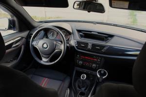 Black BMW X1 2012 in Riga, with an engine capacity of 2.00 L and mileage of 274 thousand km for 6990 €, photo 26 on AUTOMOTO.COM.LV