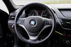 Black BMW X1 2012 in Riga, with an engine capacity of 2.00 L and mileage of 274 thousand km for 6990 €, photo 32 on AUTOMOTO.COM.LV