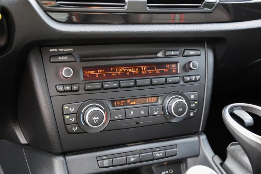 Black BMW X1 2012 in Riga, with an engine capacity of 2.00 L and mileage of 274 thousand km for 6990 €, photo 49 on AUTOMOTO.COM.LV