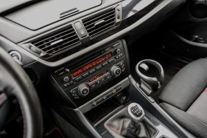 Black BMW X1 2012 in Riga, with an engine capacity of 2.00 L and mileage of 274 thousand km for 6990 €, photo 50 on AUTOMOTO.COM.LV