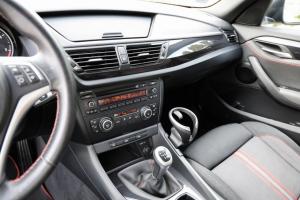 Black BMW X1 2012 in Riga, with an engine capacity of 2.00 L and mileage of 274 thousand km for 6990 €, photo 51 on AUTOMOTO.COM.LV
