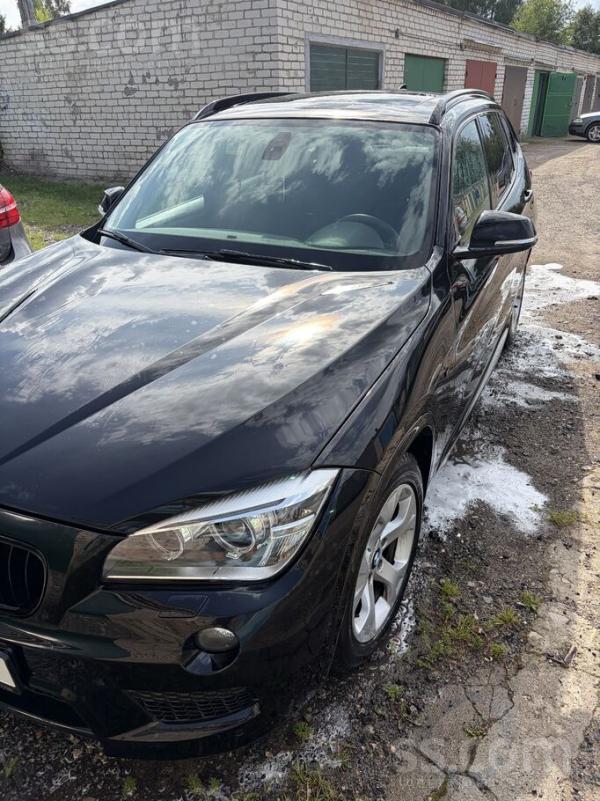 Black BMW X1 2012 in Riga, with an engine capacity of 2.00 L and mileage of 310 thousand km for 8695 €, photo 11 on AUTOMOTO.COM.LV