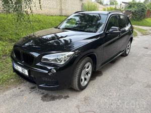 Black BMW X1 2012 in Riga, with an engine capacity of 2.00 L and mileage of 310 thousand km for 8695 €, photo 13 on AUTOMOTO.COM.LV