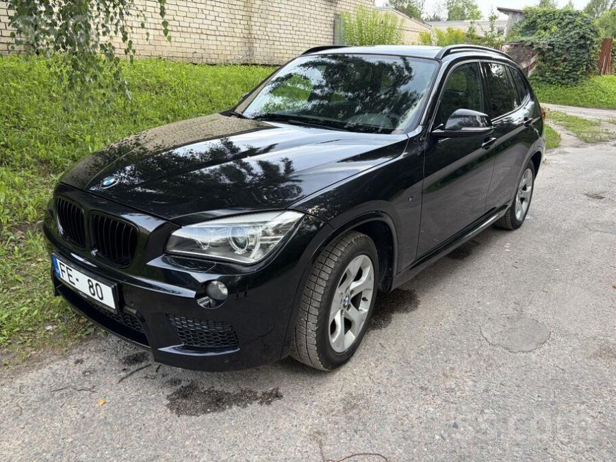 Black BMW X1 2012 in Riga, with an engine capacity of 2.00 L and mileage of 310 thousand km for 8695 €, photo 13 on AUTOMOTO.COM.LV