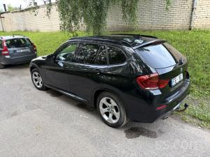 Black BMW X1 2012 in Riga, with an engine capacity of 2.00 L and mileage of 310 thousand km for 8695 €, photo 14 on AUTOMOTO.COM.LV