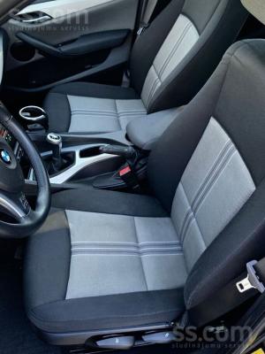 Black BMW X1 2012 in Riga, with an engine capacity of 2.00 L and mileage of 295 thousand km for 7500 €, photo 13 on AUTOMOTO.COM.LV