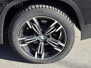 Black BMW X1 2012 in Riga, with an engine capacity of 2.00 L and mileage of 295 thousand km for 7500 €, photo 16 on AUTOMOTO.COM.LV