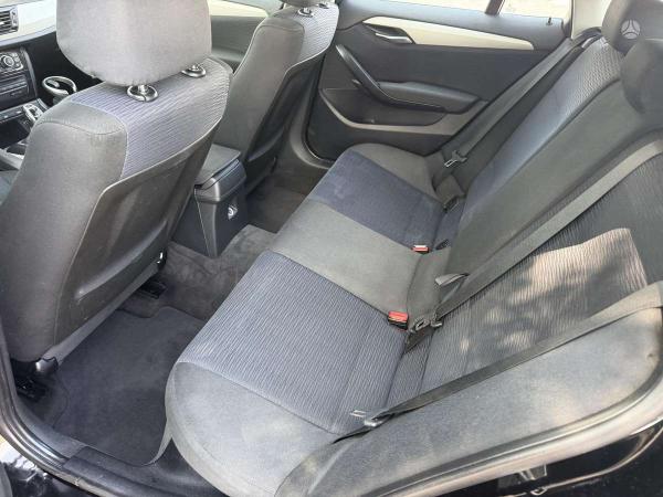 Black BMW X1 2012 in Marijampole, with an engine capacity of 2.00 L and mileage of 289 thousand km for 6450 €, photo 9 on AUTOMOTO.COM.LV