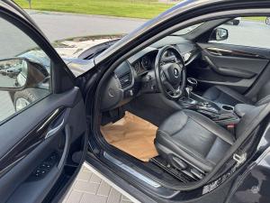 Black BMW X1 2012 in Telschi, with an engine capacity of 2.00 L and mileage of 245 thousand km for 8800 €, photo 17 on AUTOMOTO.COM.LV