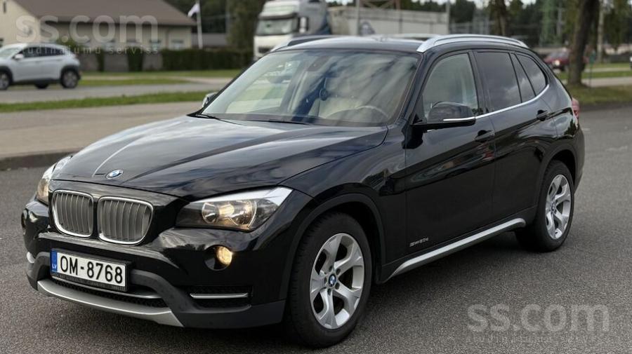 Black BMW X1 2012 in Riga, with an engine capacity of 2.00 L and mileage of 0 thousand km for 6750 €, photo 1 on AUTOMOTO.COM.LV