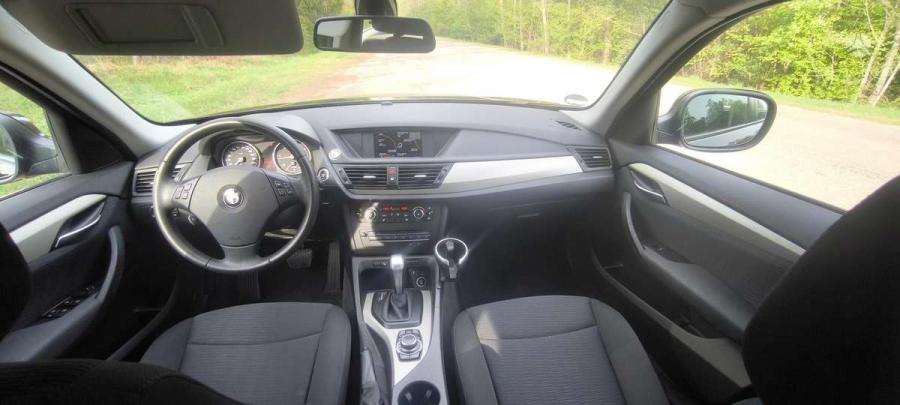 Black BMW X1 2012 in Kaunas, with an engine capacity of 2.00 L and mileage of 218 thousand km for 7300 €, photo 6 on AUTOMOTO.COM.LV