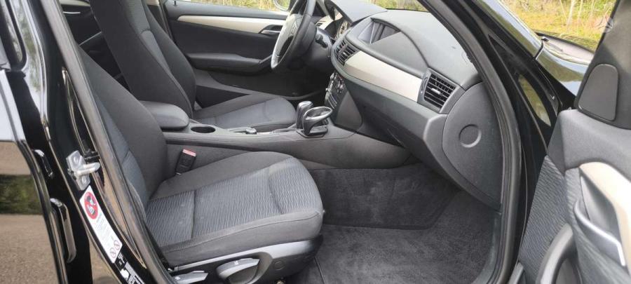 Black BMW X1 2012 in Kaunas, with an engine capacity of 2.00 L and mileage of 218 thousand km for 7300 €, photo 12 on AUTOMOTO.COM.LV