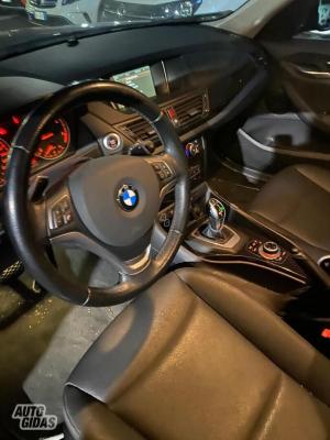 Black BMW X1 2013 in Panevezys, with an engine capacity of 2.00 L and mileage of 295 thousand km for 7199 €, photo 6 on AUTOMOTO.COM.LV