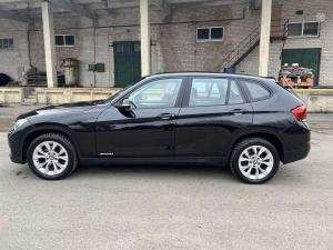 Black BMW X1 2013 in Kelme, with an engine capacity of 2.00 L and mileage of 261 thousand km for 6400 €, photo 4 on AUTOMOTO.COM.LV