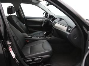 Black BMW X1 2013 in Vilnius, with an engine capacity of 2.00 L and mileage of 151 thousand km for 11699 €, photo 14 on AUTOMOTO.COM.LV