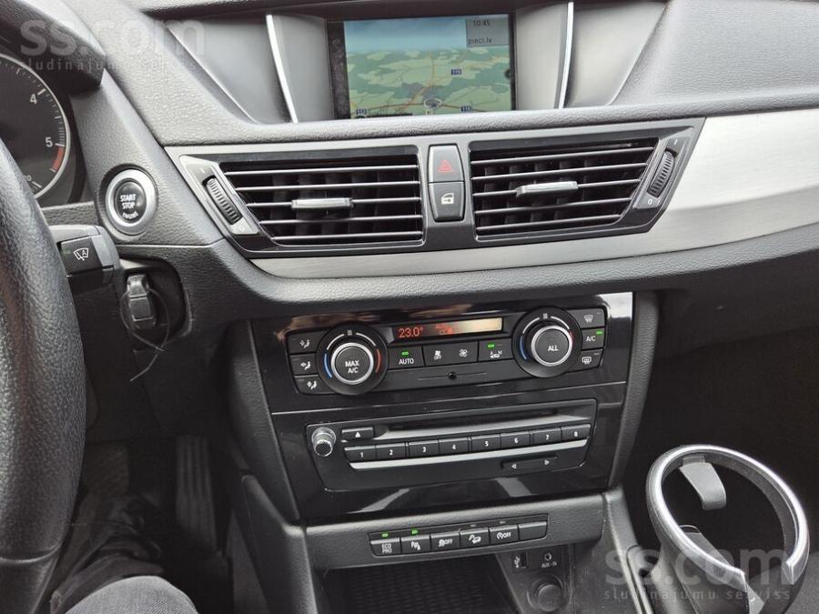 Black BMW X1 2013 in Kuldiga, with an engine capacity of 2.00 L and mileage of 257 thousand km for 7300 €, photo 12 on AUTOMOTO.COM.LV