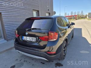Black BMW X1 2013 in Jelgava, with an engine capacity of 2.00 L and mileage of 219 thousand km for 8300 €, photo 4 on AUTOMOTO.COM.LV