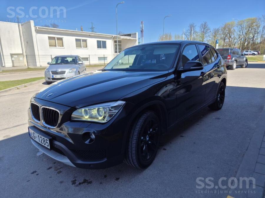 Black BMW X1 2013 in Jelgava, with an engine capacity of 2.00 L and mileage of 219 thousand km for 8300 €, photo 6 on AUTOMOTO.COM.LV