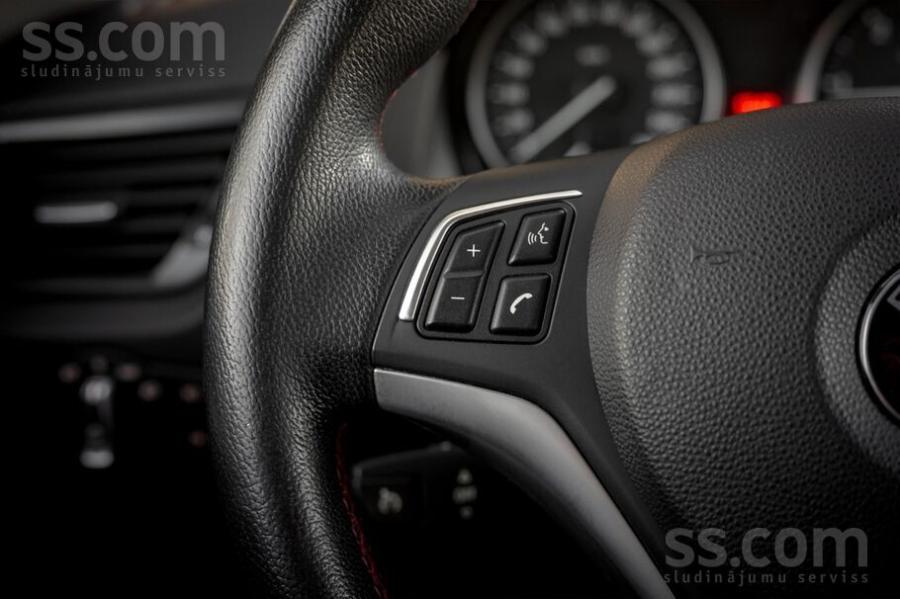 Black BMW X1 2013 in Talsi, with an engine capacity of 2.00 L and mileage of 148 thousand km for 11950 €, photo 18 on AUTOMOTO.COM.LV