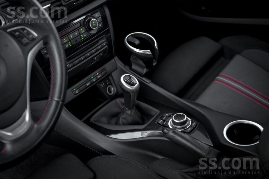 Black BMW X1 2013 in Talsi, with an engine capacity of 2.00 L and mileage of 148 thousand km for 11950 €, photo 27 on AUTOMOTO.COM.LV