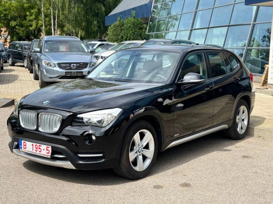 Black BMW X1 2013 in Riga, with an engine capacity of 2.00 L and mileage of 181 thousand km for 9499 €, photo 4 on AUTOMOTO.COM.LV