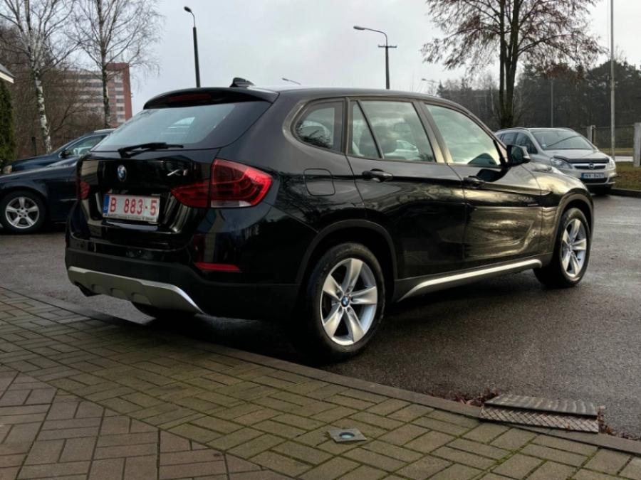 Black BMW X1 2013 in Riga, with an engine capacity of 2.00 L and mileage of 181 thousand km for 9499 €, photo 6 on AUTOMOTO.COM.LV