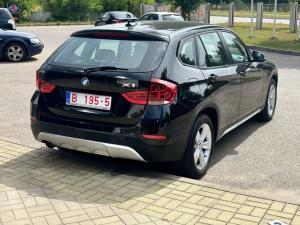 Black BMW X1 2013 in Riga, with an engine capacity of 2.00 L and mileage of 181 thousand km for 9499 €, photo 10 on AUTOMOTO.COM.LV